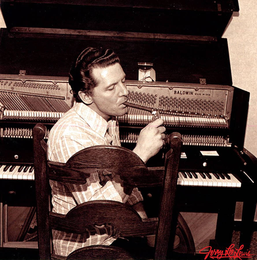 Jerry Lee Lewis Lighting Up Cigar Wallpaper | WallpapersOK